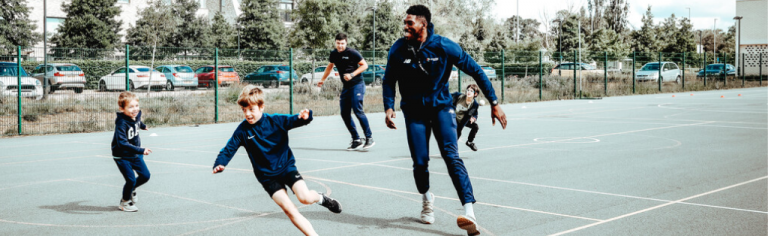 What are the characteristics of a good coach in sport?